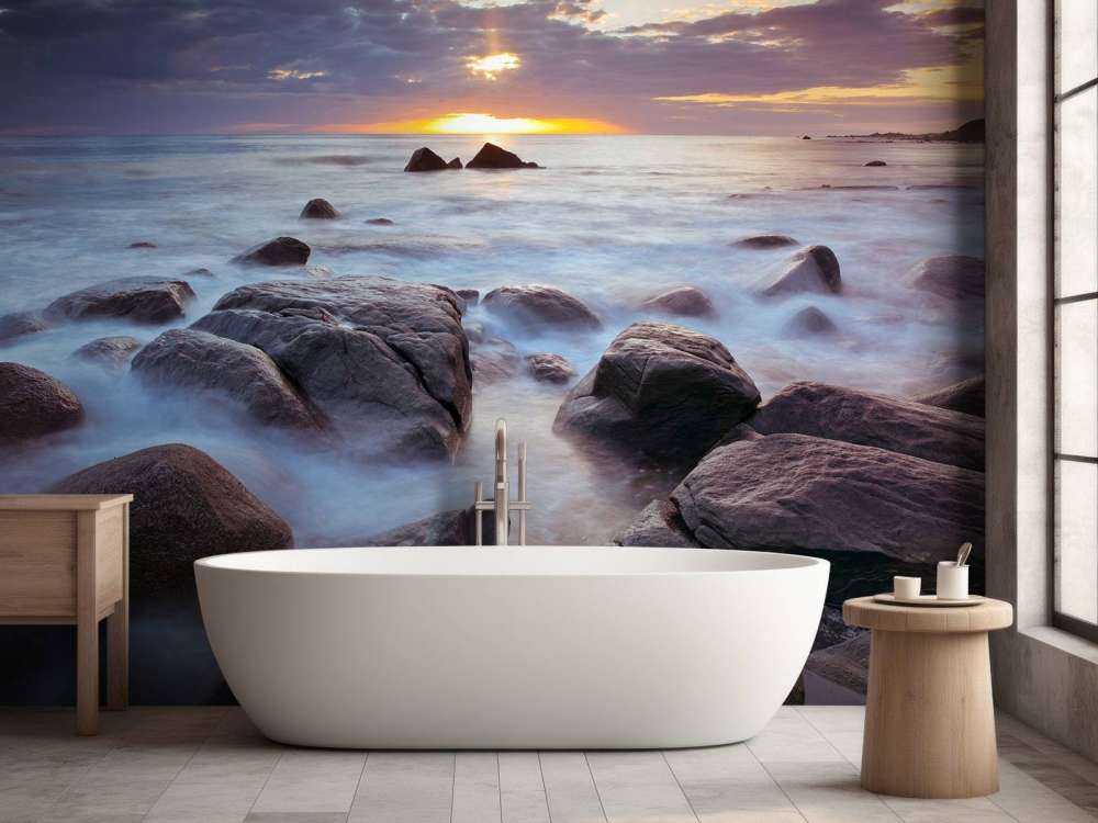 Papier Peint Panoramique Coucher de soleil sur une côte rocheuse